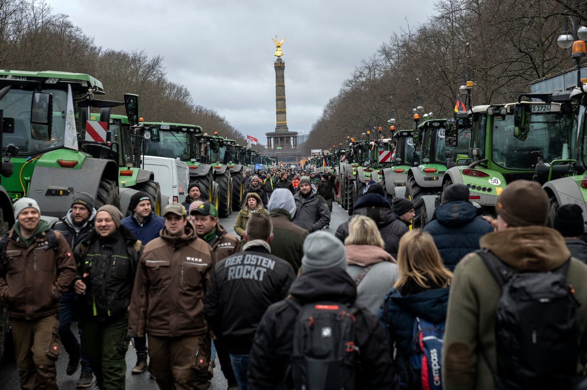 German farmers and their tractors throng Berlin in a protest against ...